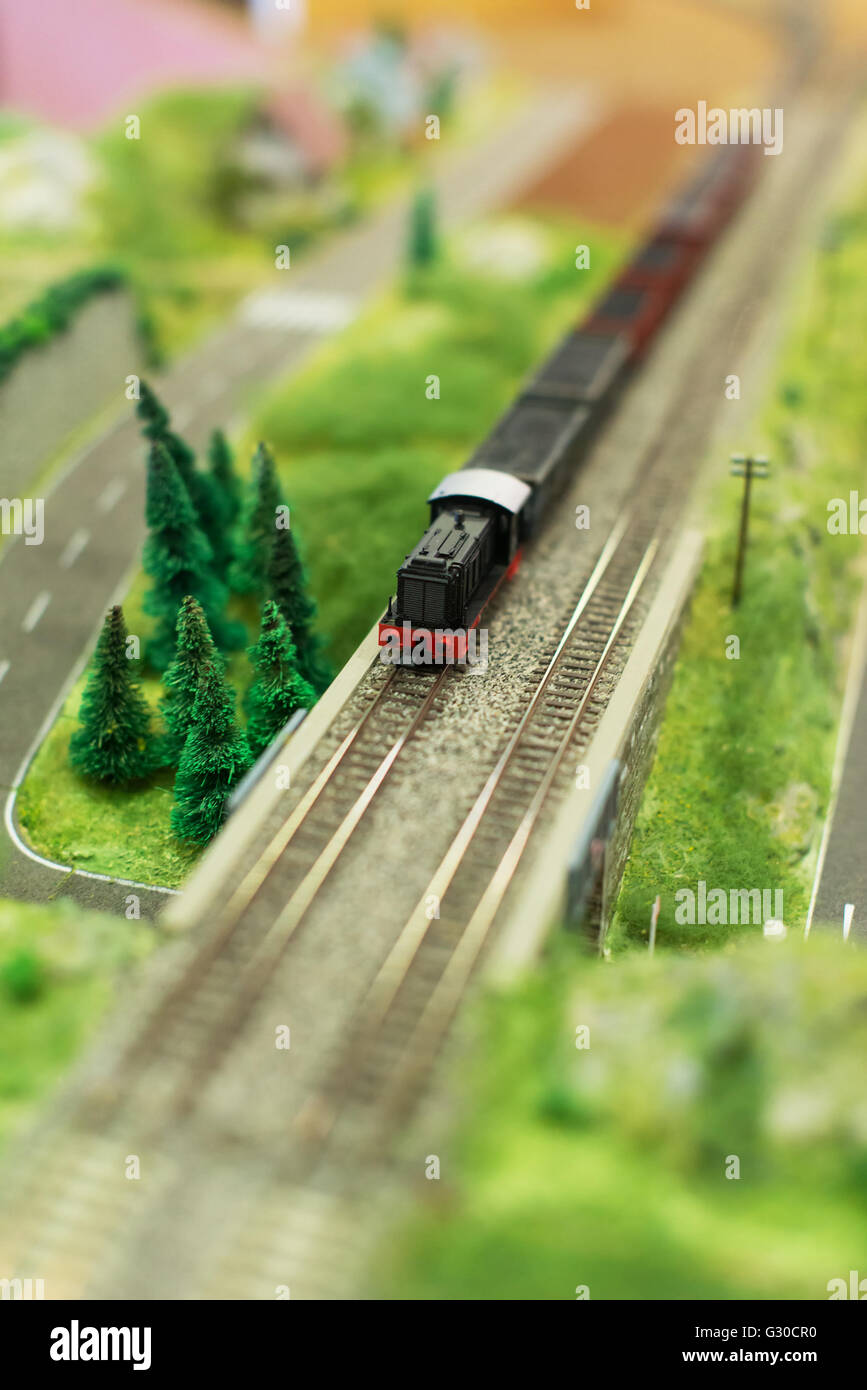 City in miniature. Miniature model of train with wagons Stock Photo - Alamy