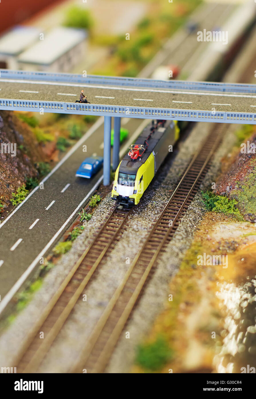 City in miniature. Electric train near the speedway Stock Photo - Alamy