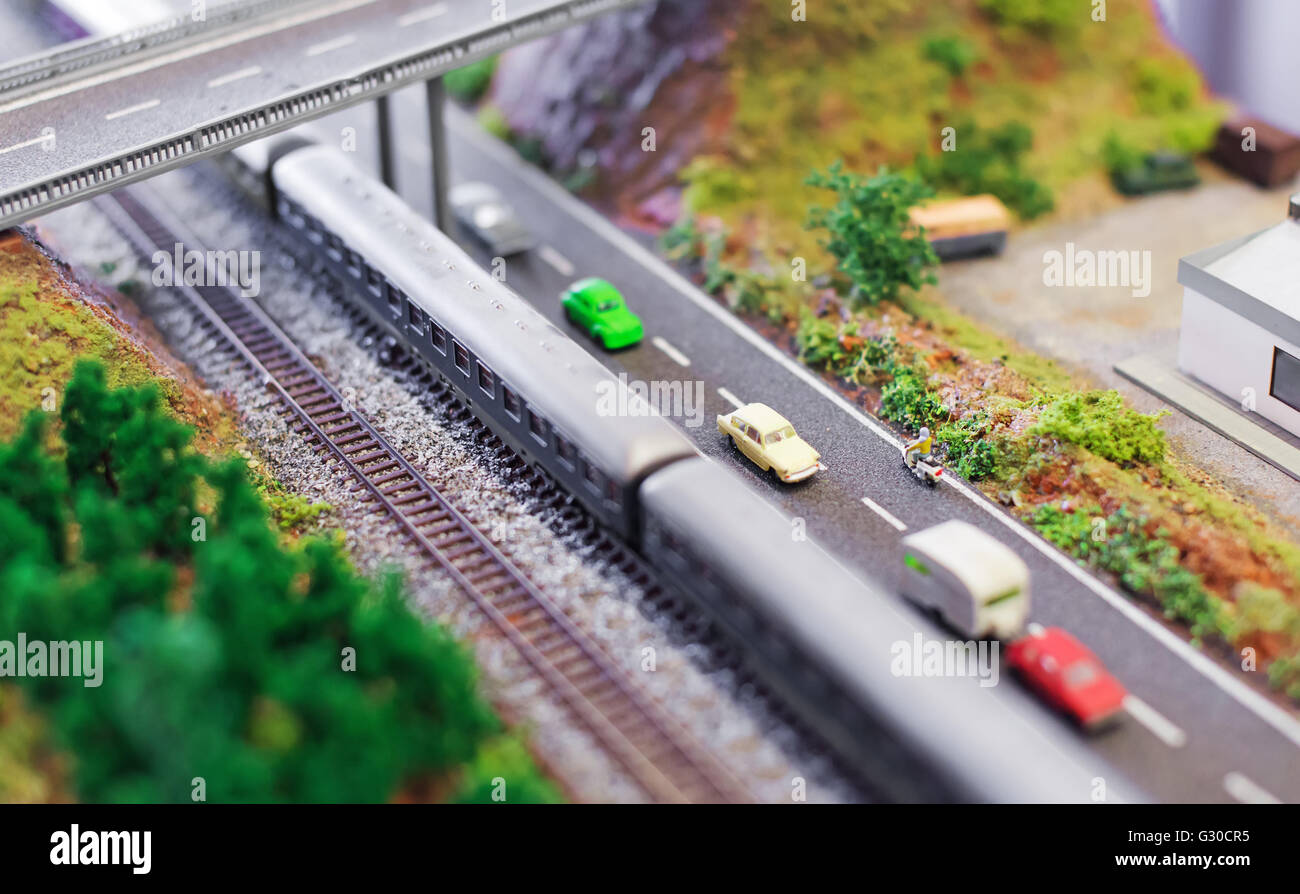 City in miniature. Electric train near the speedway Stock Photo - Alamy