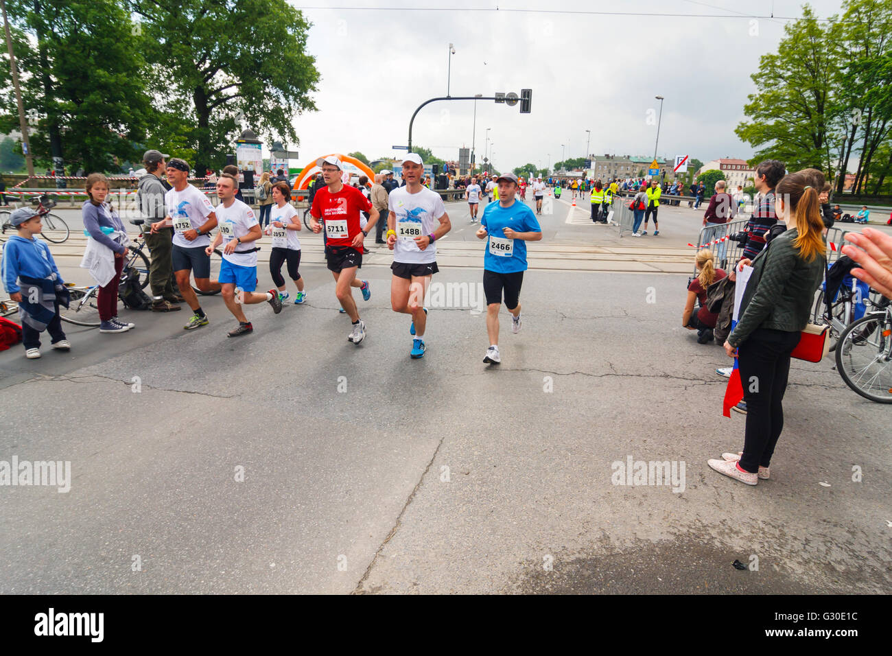 KRAKOW, POLAND - MAY 18 : Cracovia Marathon. Runners on the city ...