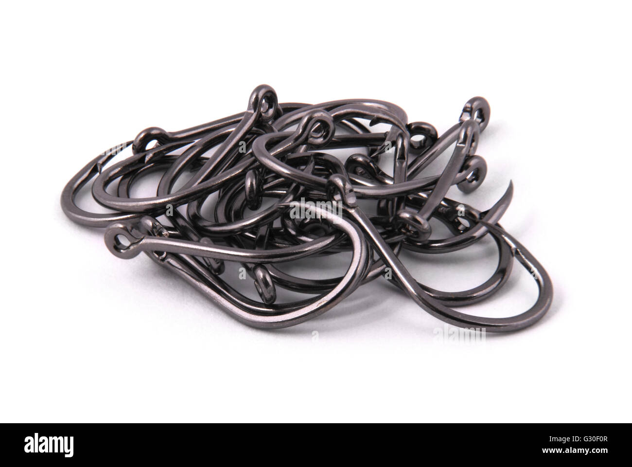 Many black fish hook isolated on white Stock Photo - Alamy