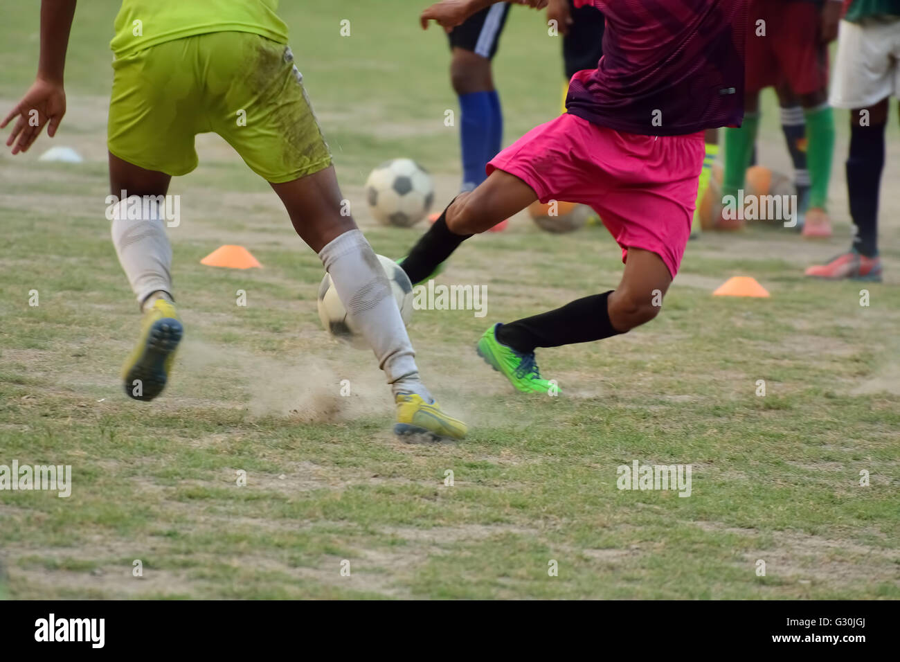 Boy is going to kick soccer ball Stock Photo - Alamy