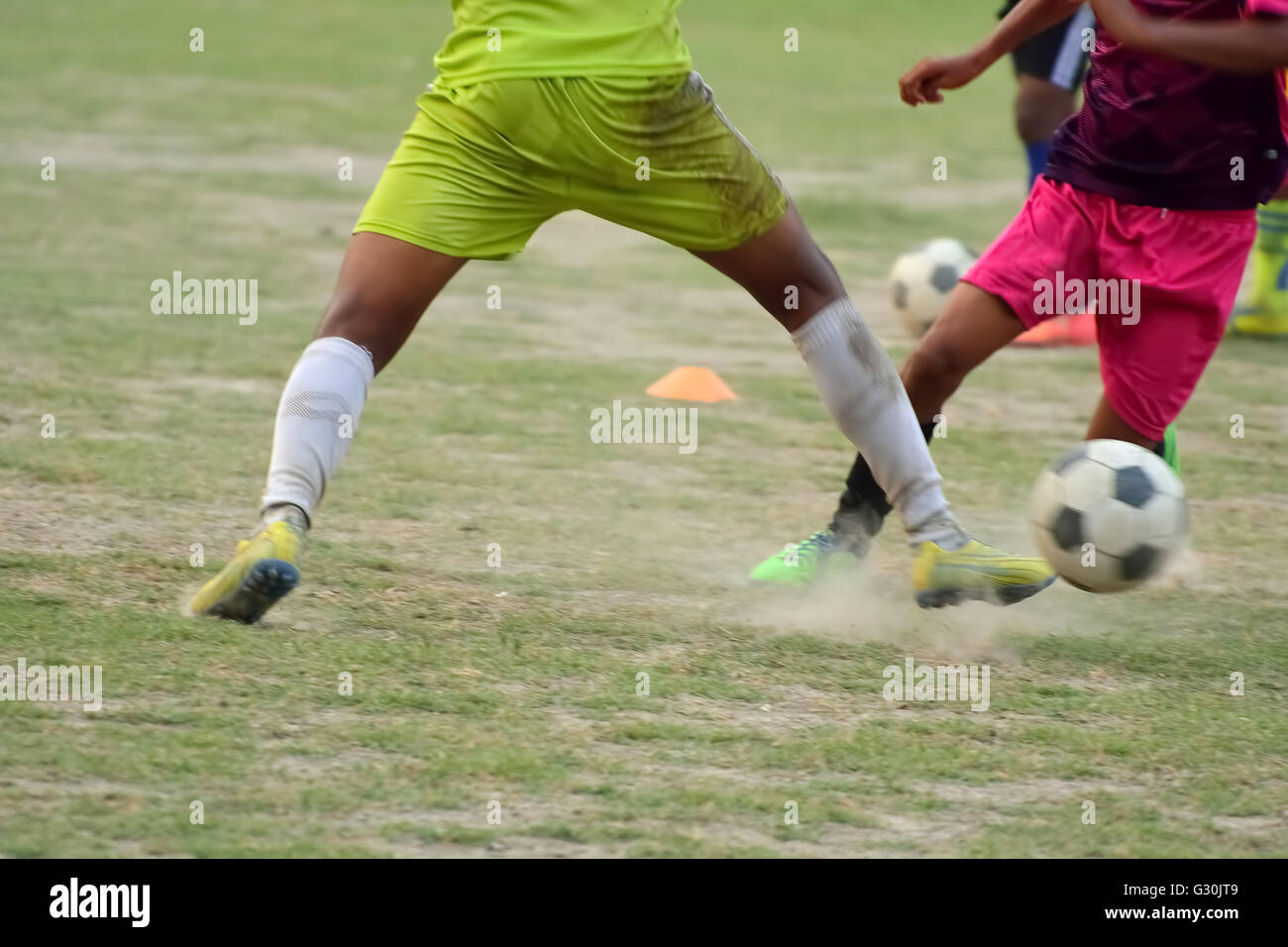 Boy is going to kick soccer ball Stock Photo - Alamy