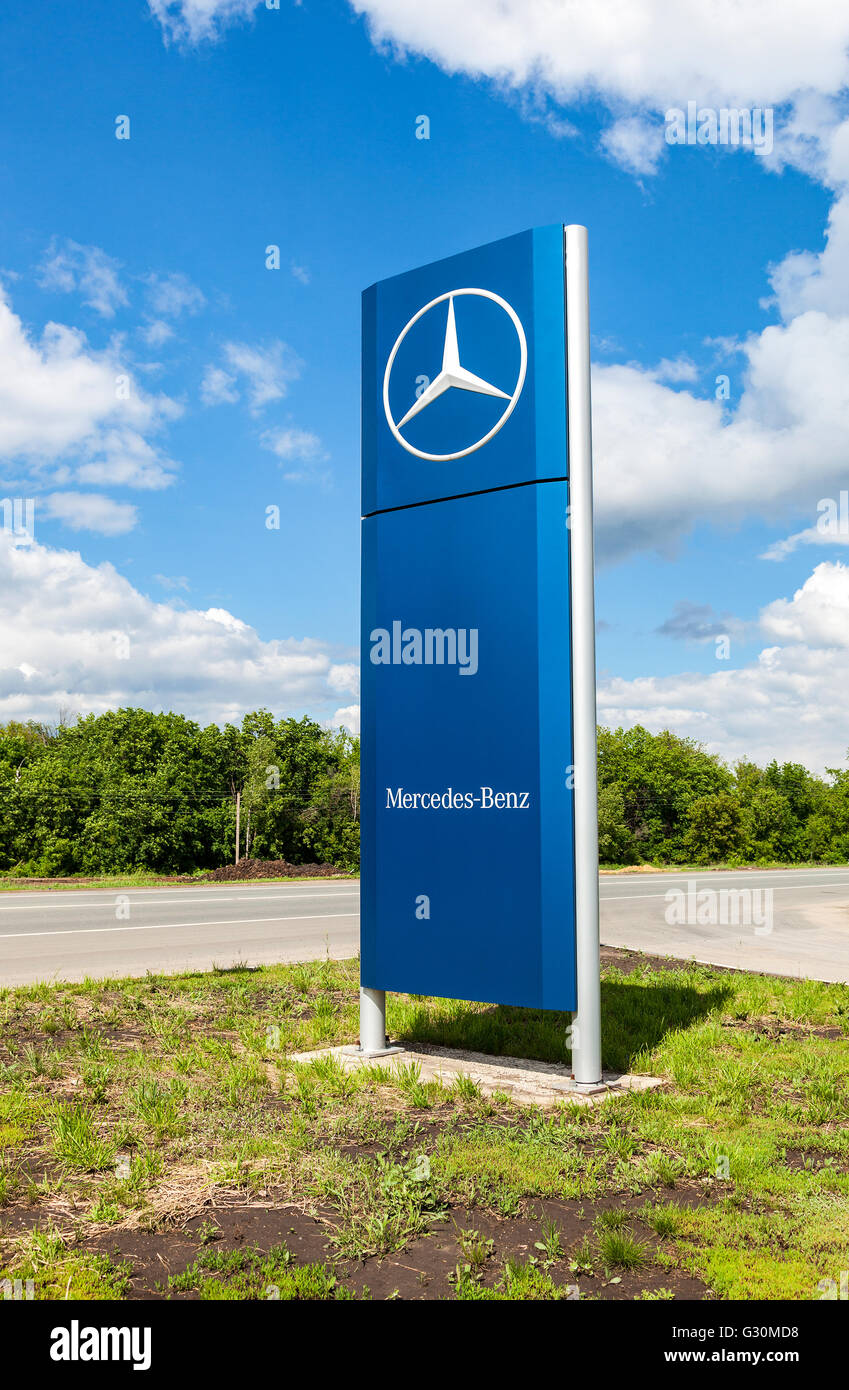 Official dealership sign of Mercedes-Benz in summer sunny day Stock ...