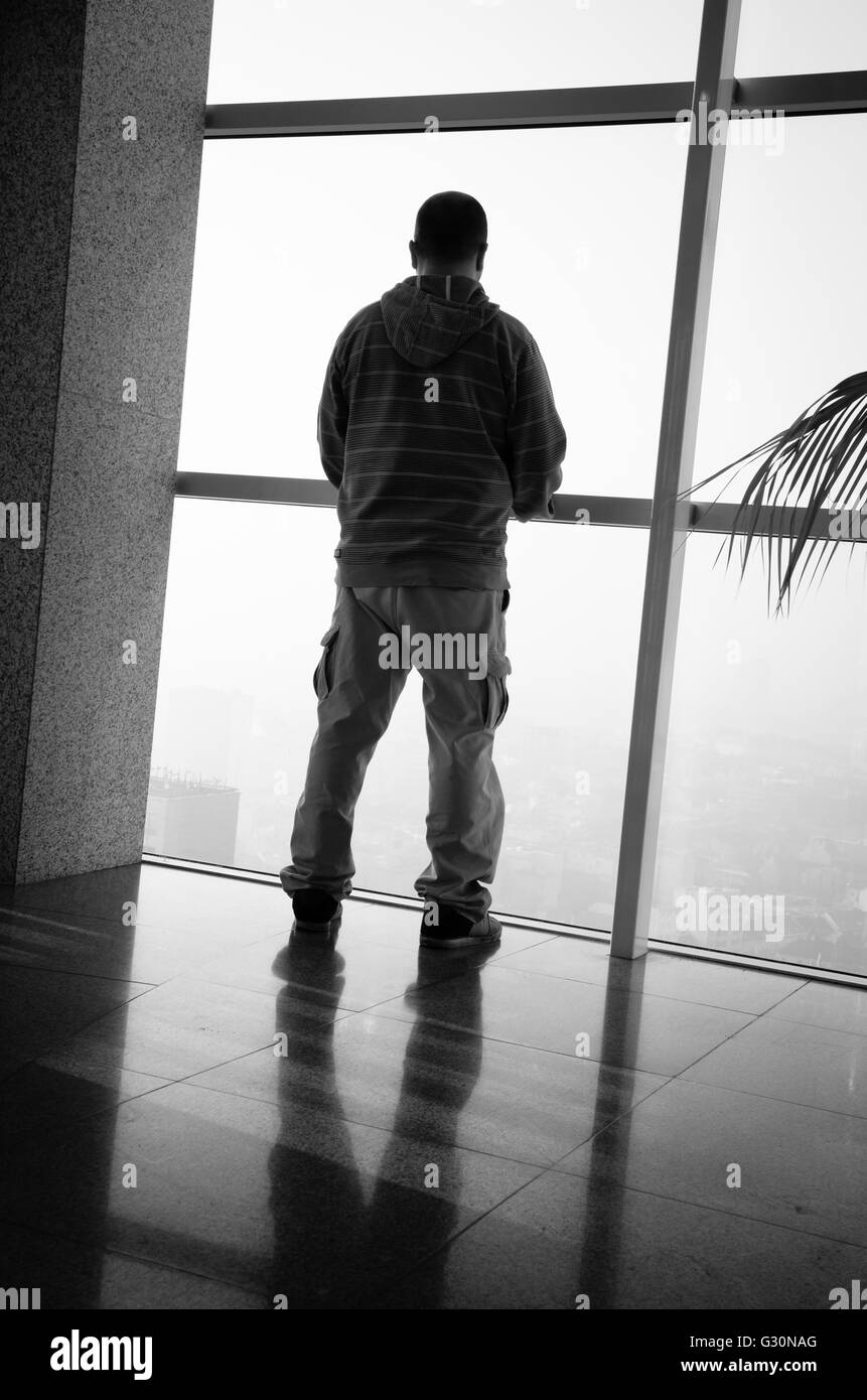 Man window silhouette hi-res stock photography and images - Alamy