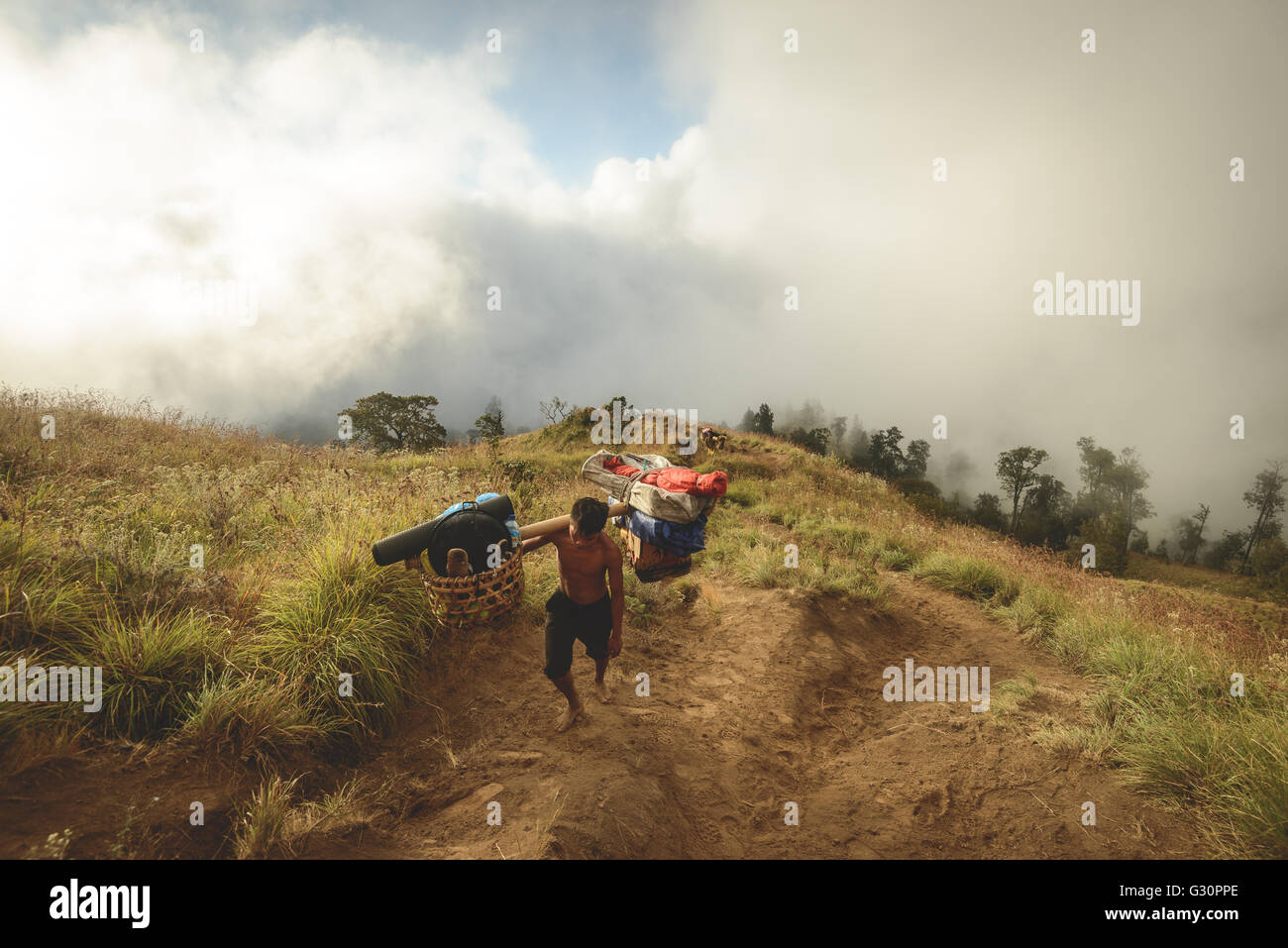 Mount Rinjani porter Stock Photo - Alamy