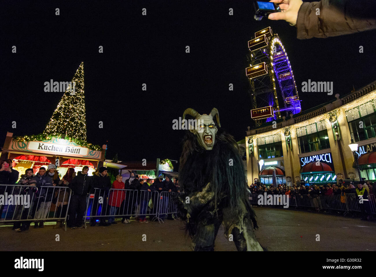 mask procession Perchtenlauf with Krampus in the Prater in front of a ...