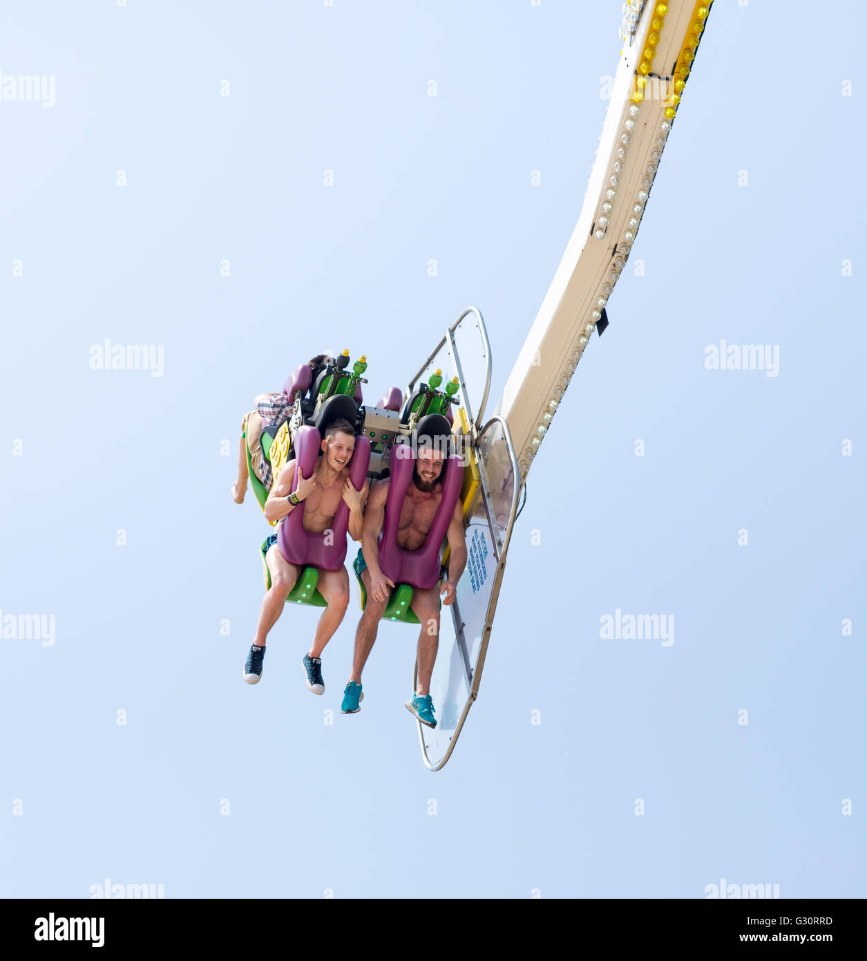 Dizzying height and speed on a beach front fairground ride, Bournemouth ...
