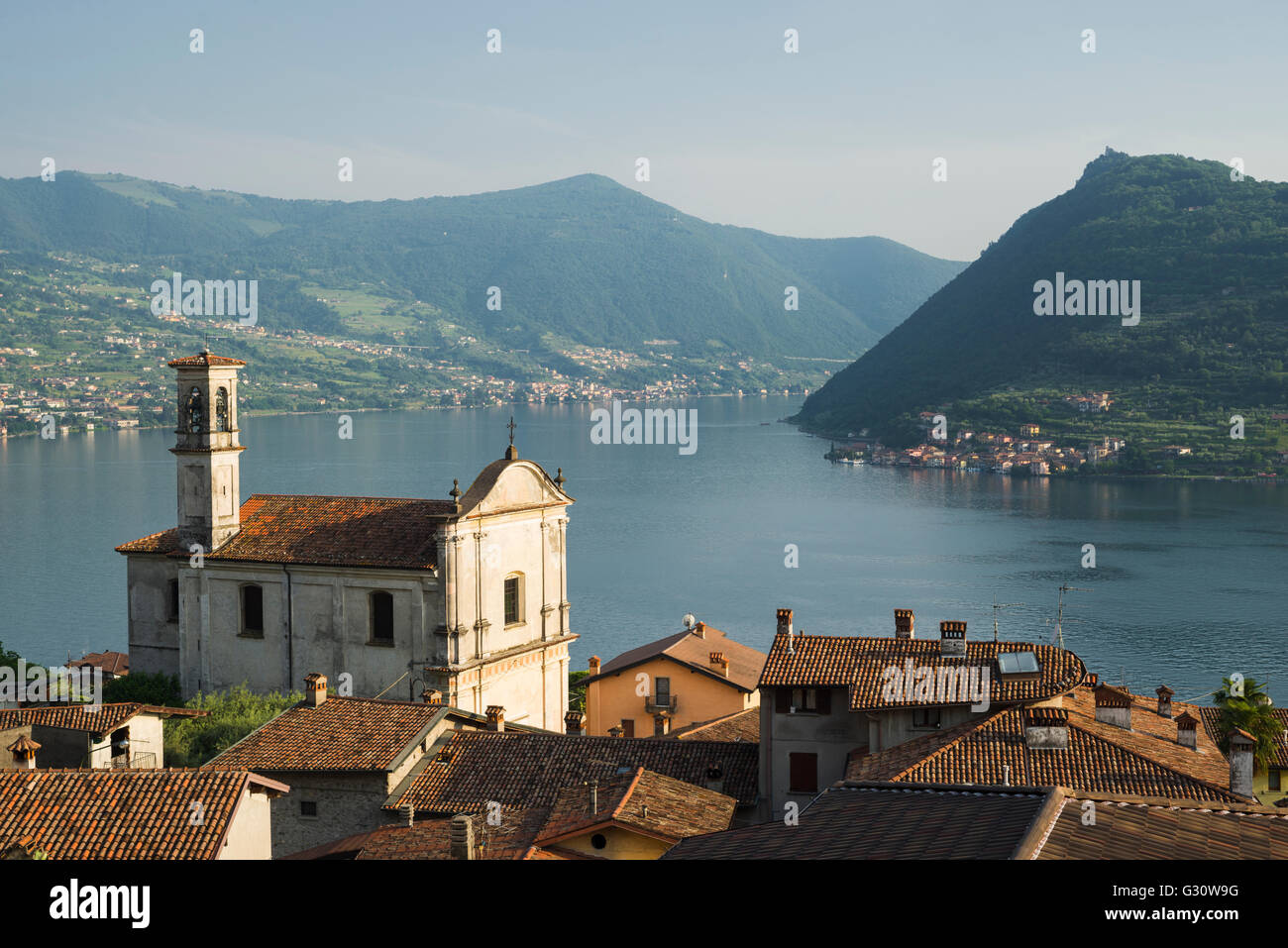 Church of San Rocco in Marone village with panorama of Lake Iseo and ...