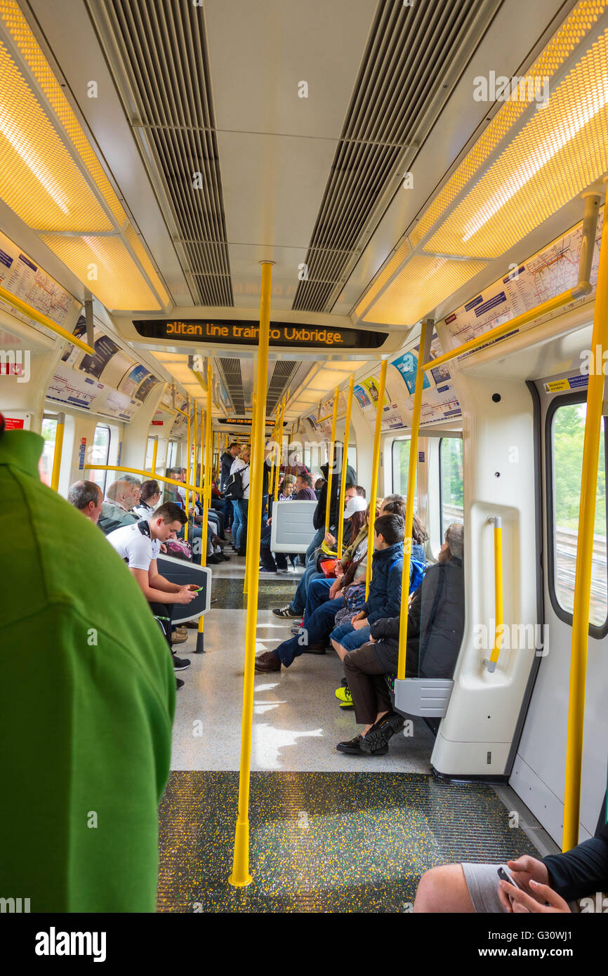 Woman standing tube train hi-res stock photography and images - Alamy
