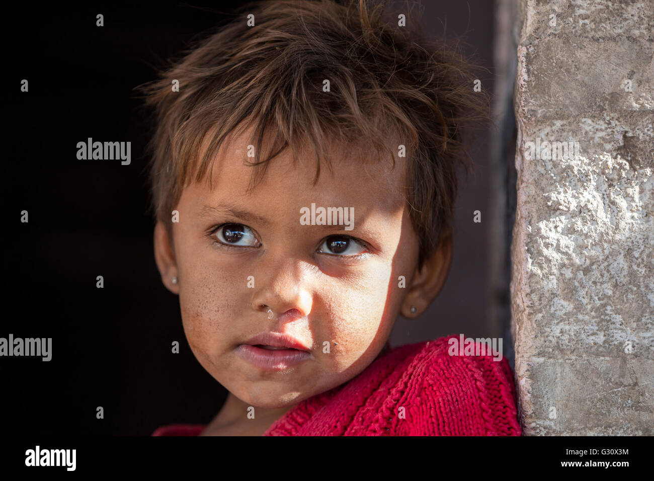 Indian boy standing on the street, India Stock Photo - Alamy