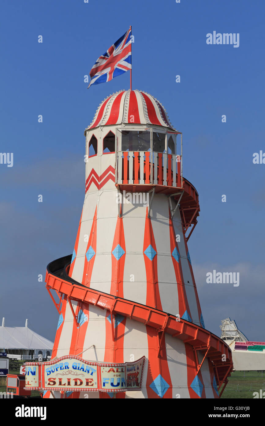 Union Jack Flag flying on top of a helter skelter big slide. Surrey ...