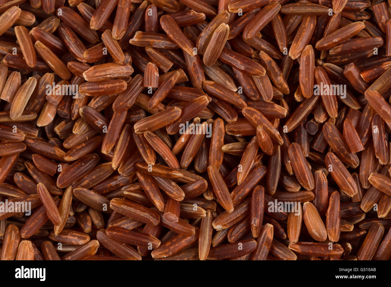 close up of background of raw red rice Stock Photo - Alamy
