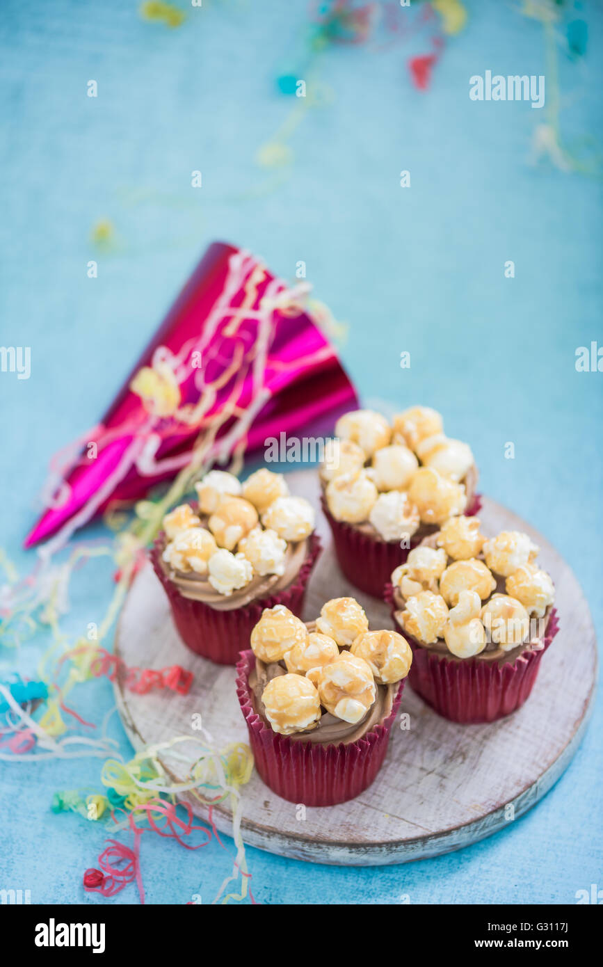 party food cupcake and hat Stock Photo - Alamy