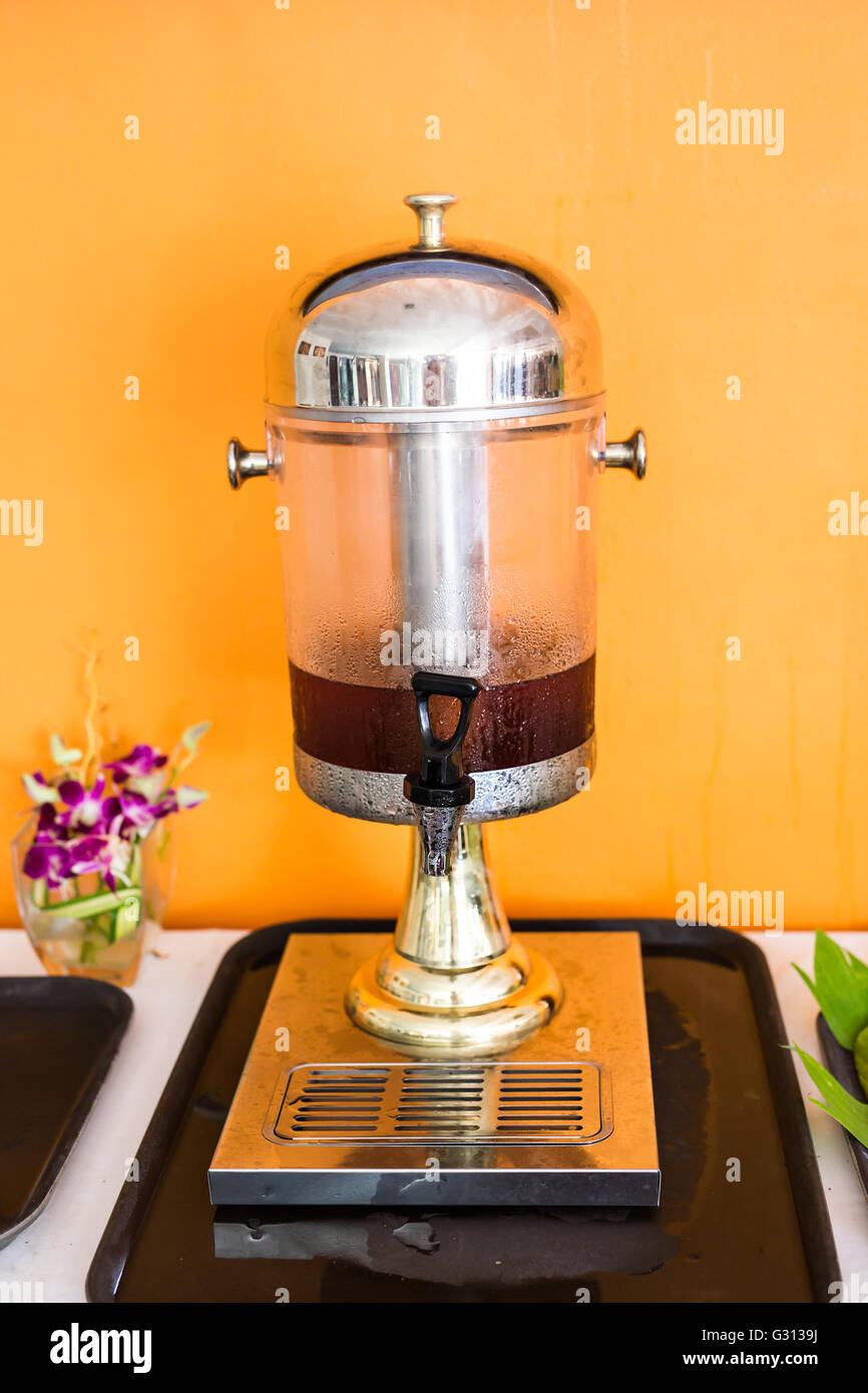 juice in water cooler for guess in the hotel Stock Photo - Alamy