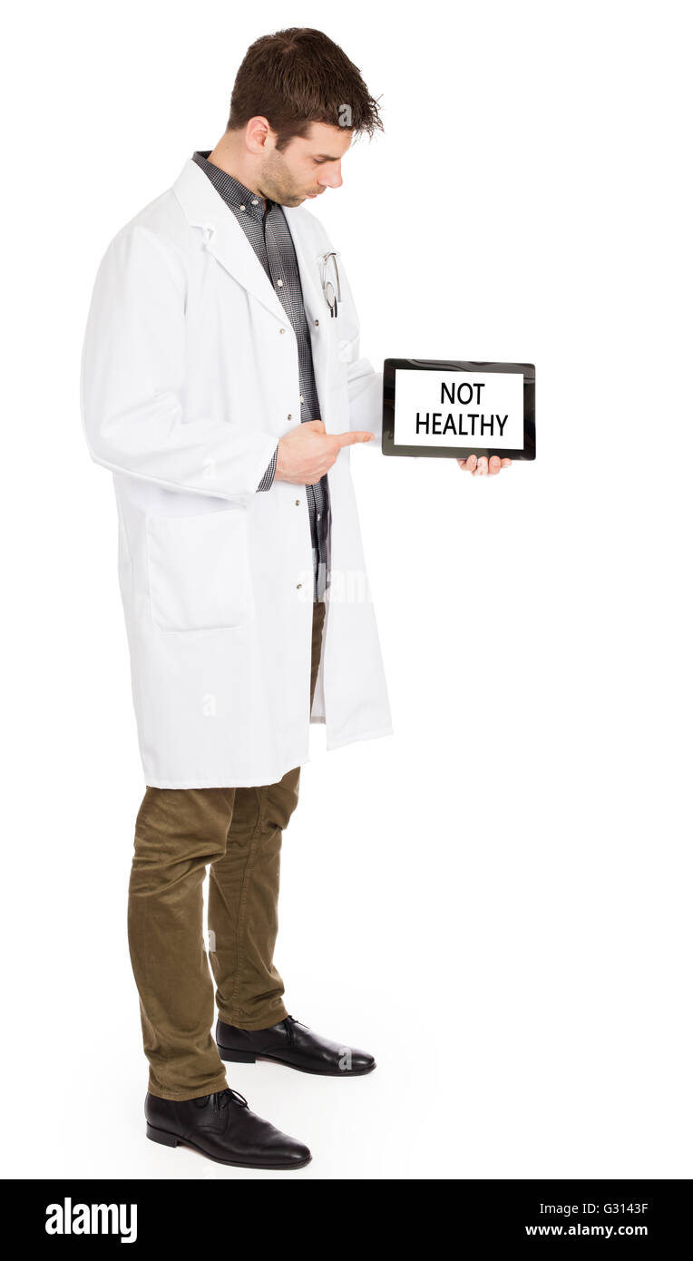 Doctor holding tablet, isolated on white - Not healthy Stock Photo - Alamy