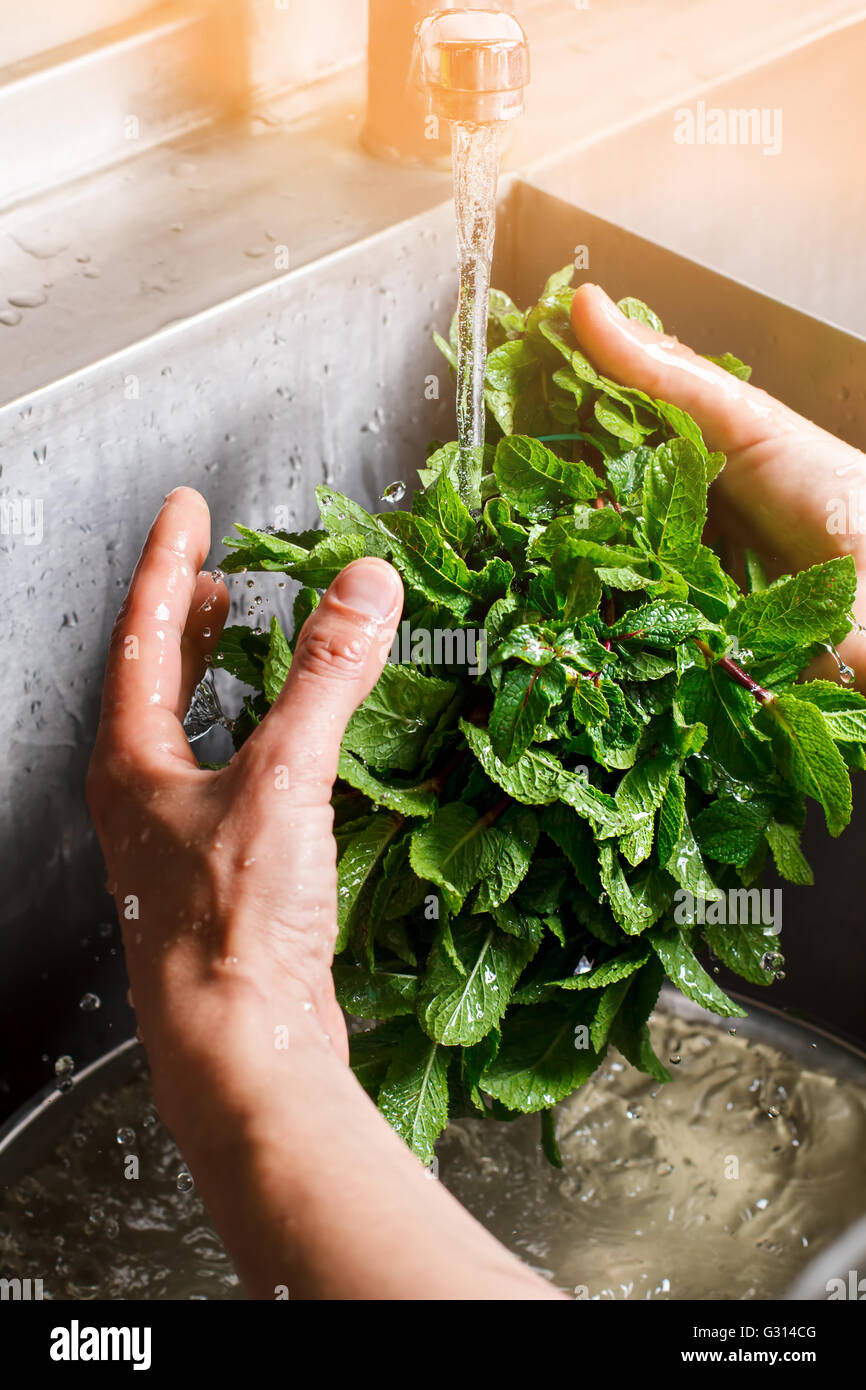 Male cook washing hands hi-res stock photography and images - Alamy