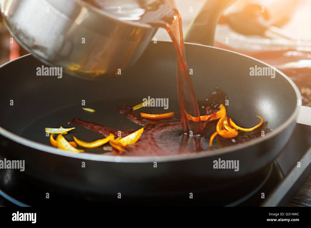 Kitchen pouring sweet sauce on hi-res stock photography and images - Alamy