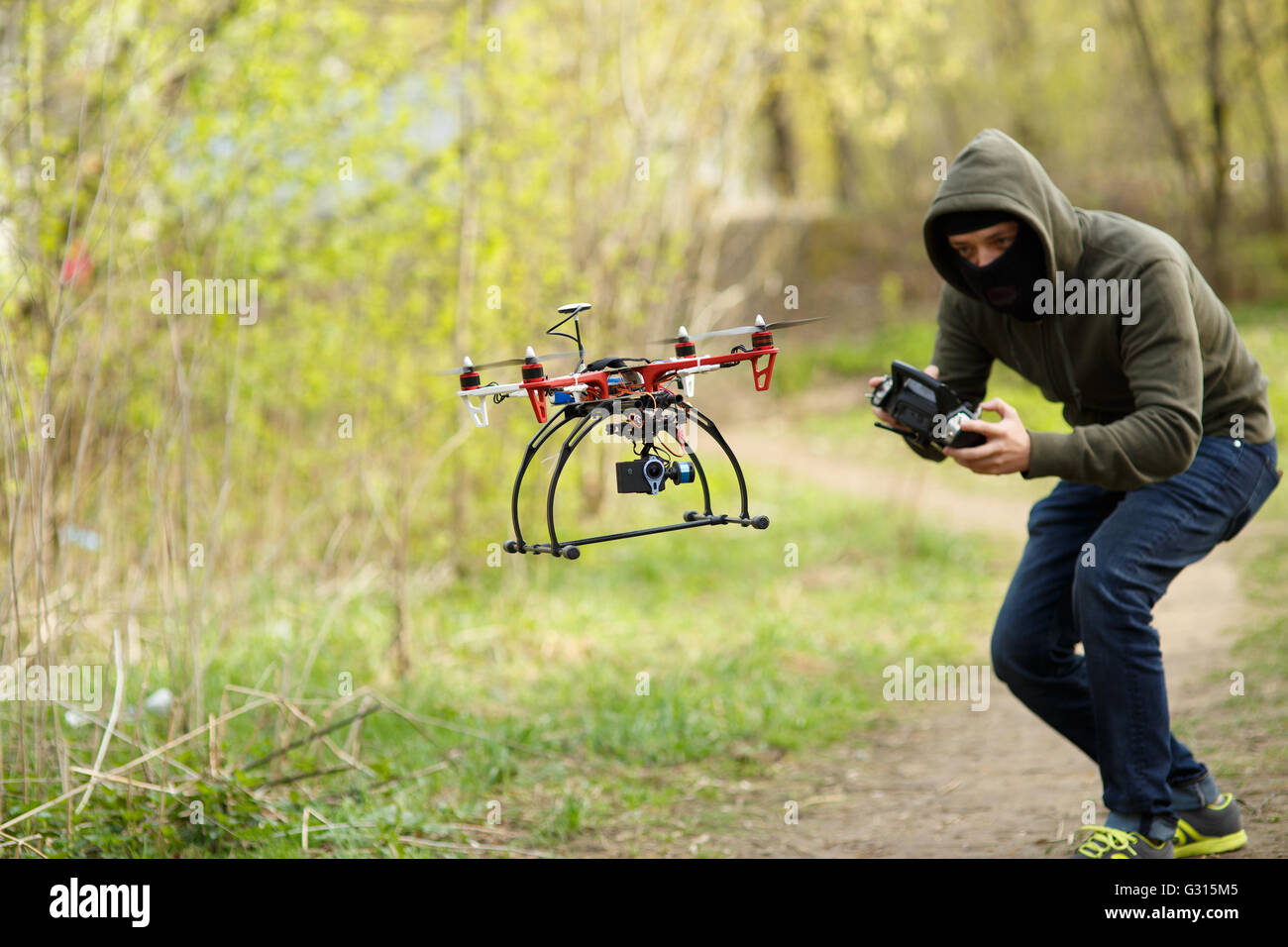 Man flying with the drone Stock Photo - Alamy