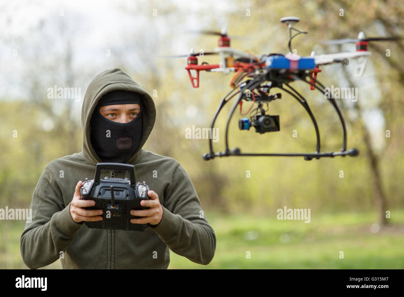 Man flying with the drone Stock Photo - Alamy
