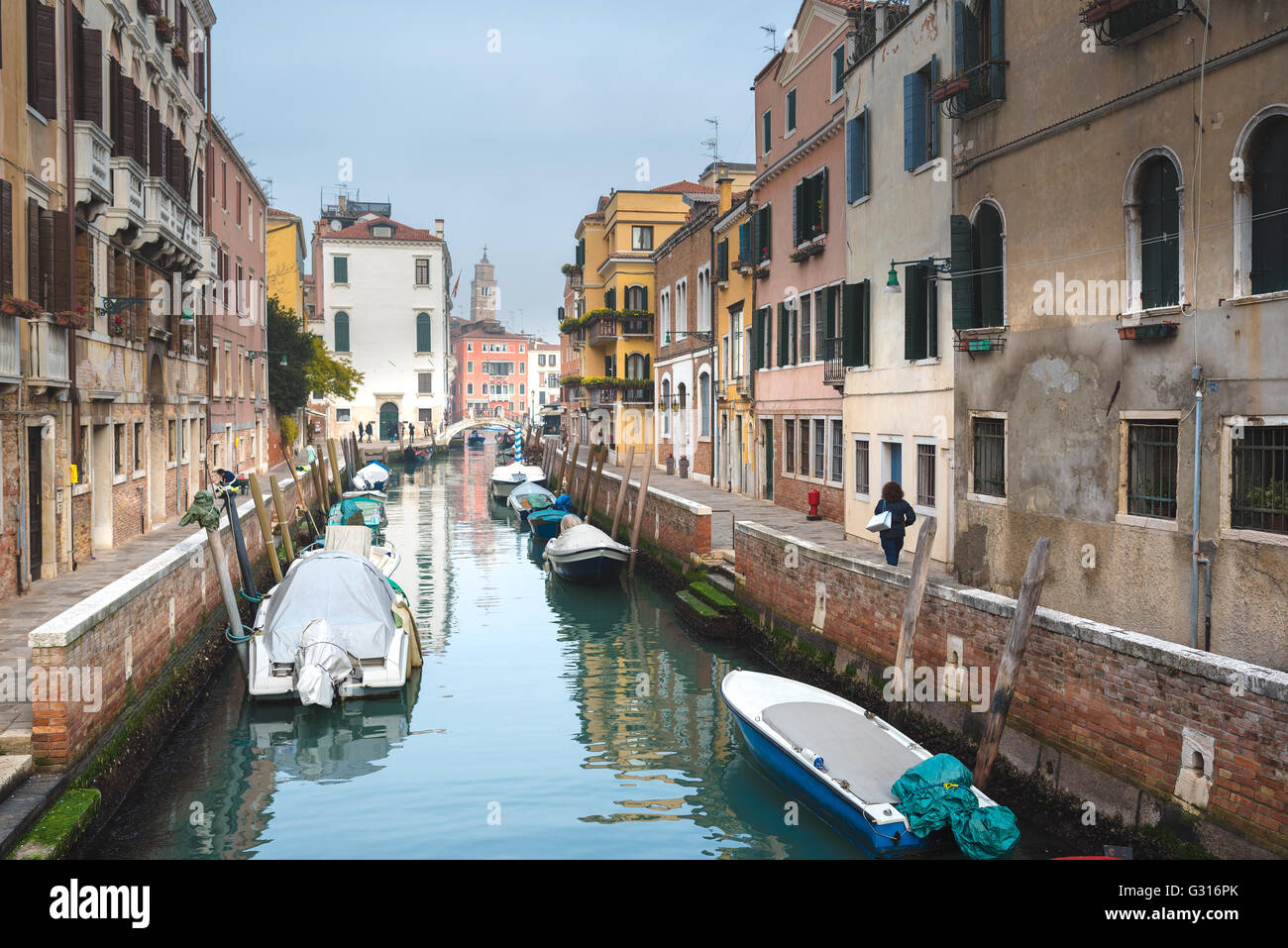 Famous Venetian water canals, historic houses and boats Stock Photo - Alamy