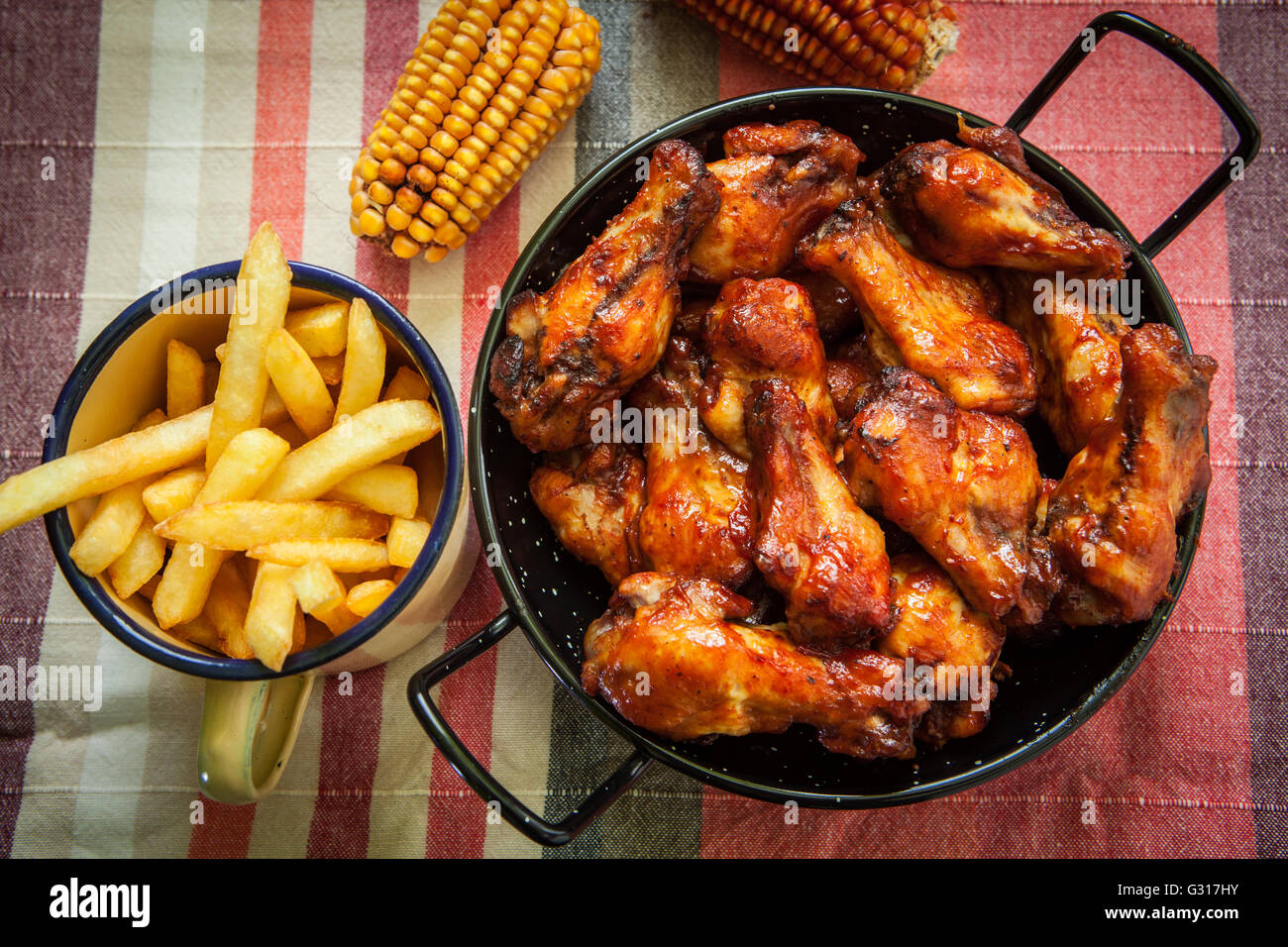 deep fried chicken leg with french fries Stock Photo - Alamy