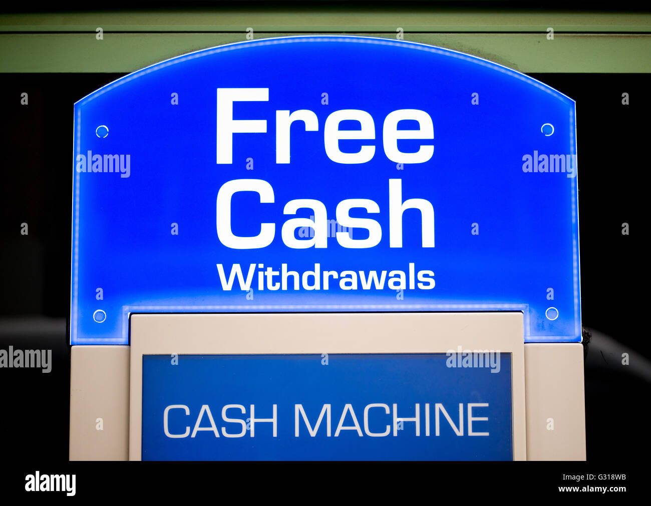 Bright blue sign, above an ATM / Cashpoint machine reading "Free Cash ...