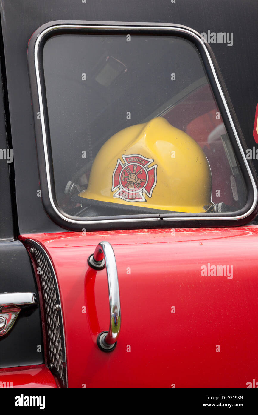 Close up of an old restored vintage Fire Engine on display with ...