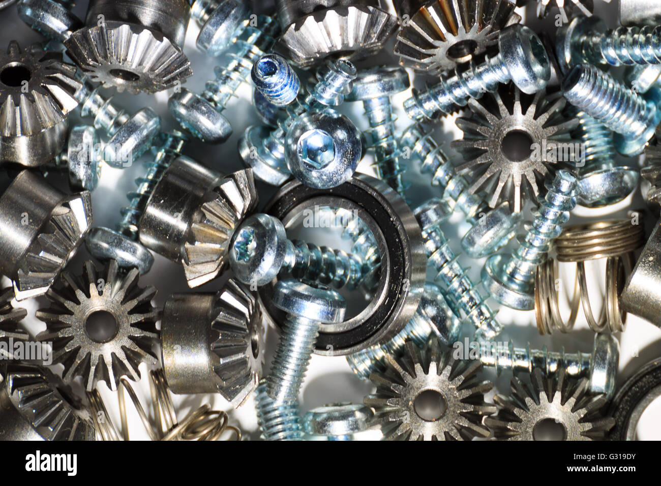 A background with different mechanical components, gears, springs ...
