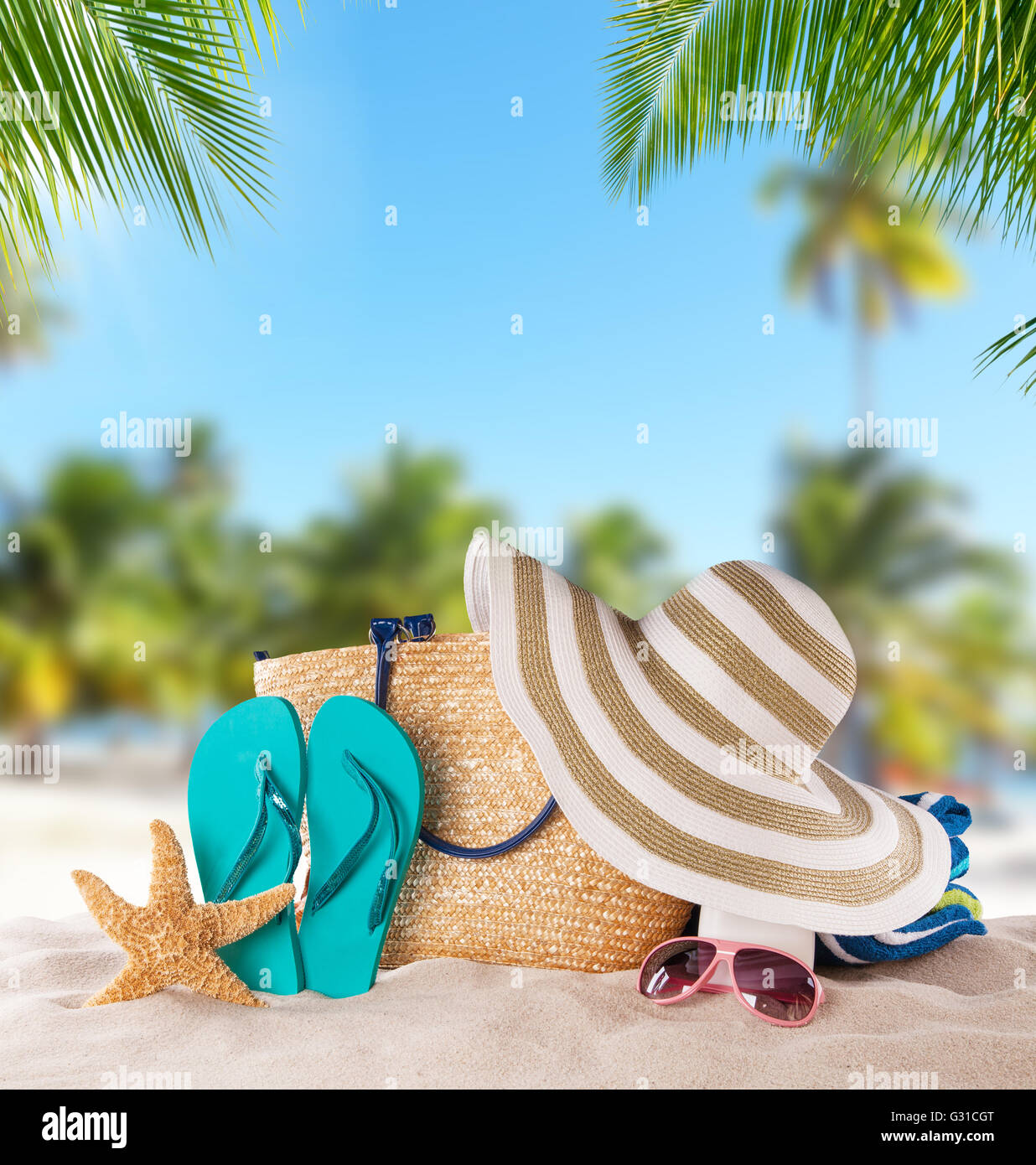 Summer concept of beach relaxation with accessories for sunbathing ...