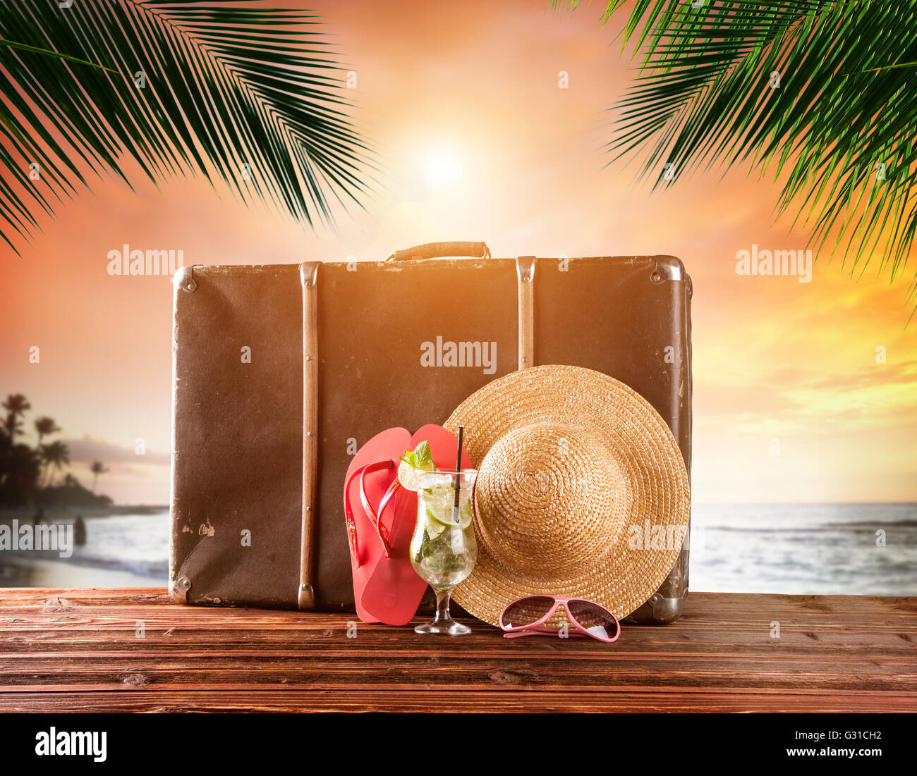 Old suitcase on tropical beach in beautiful sunset, travel concept ...