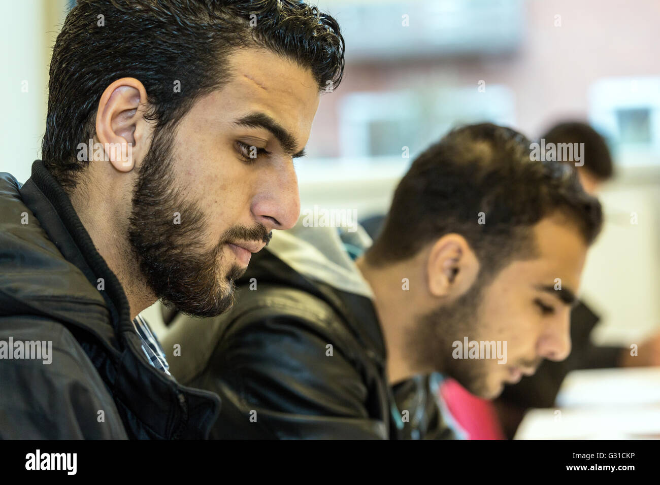 Syrian refugees germany men hi-res stock photography and images - Alamy