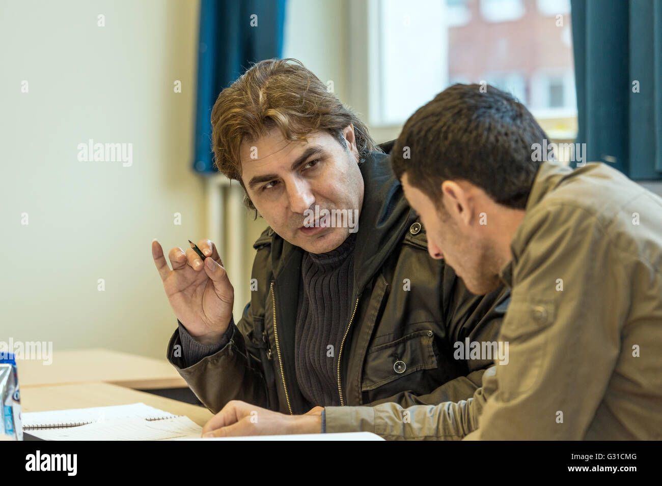 Syrian refugees germany men hi-res stock photography and images - Alamy