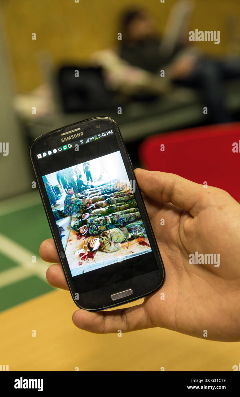 Bremen, Germany, images of Afghan soldiers on a cell phone Stock Photo ...