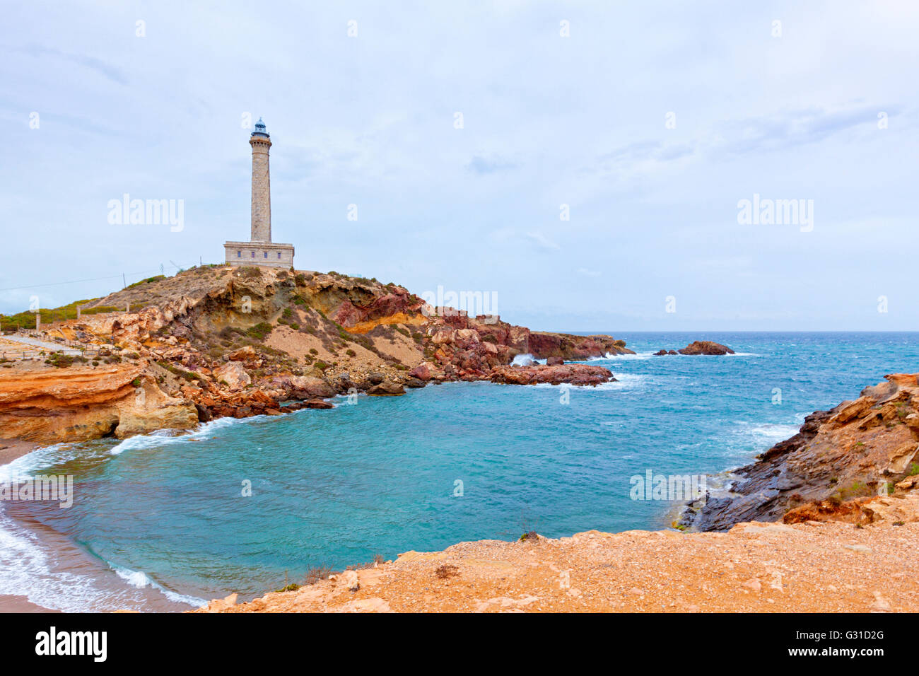 Lighthouse and bay at Cabo de Palos, Murcia province, Spain Stock Photo ...