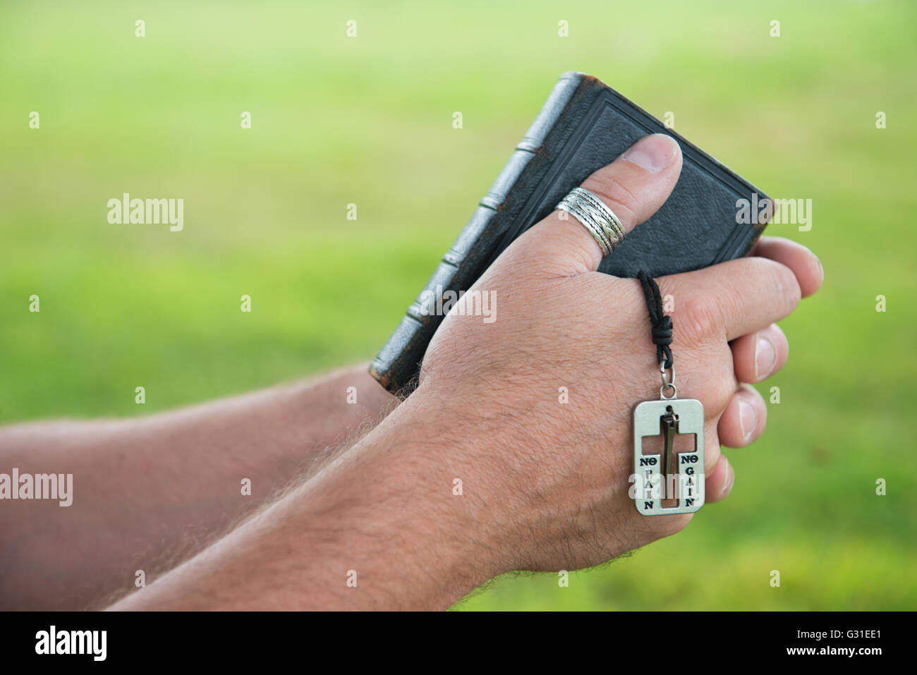 Man praying outside Stock Photo - Alamy