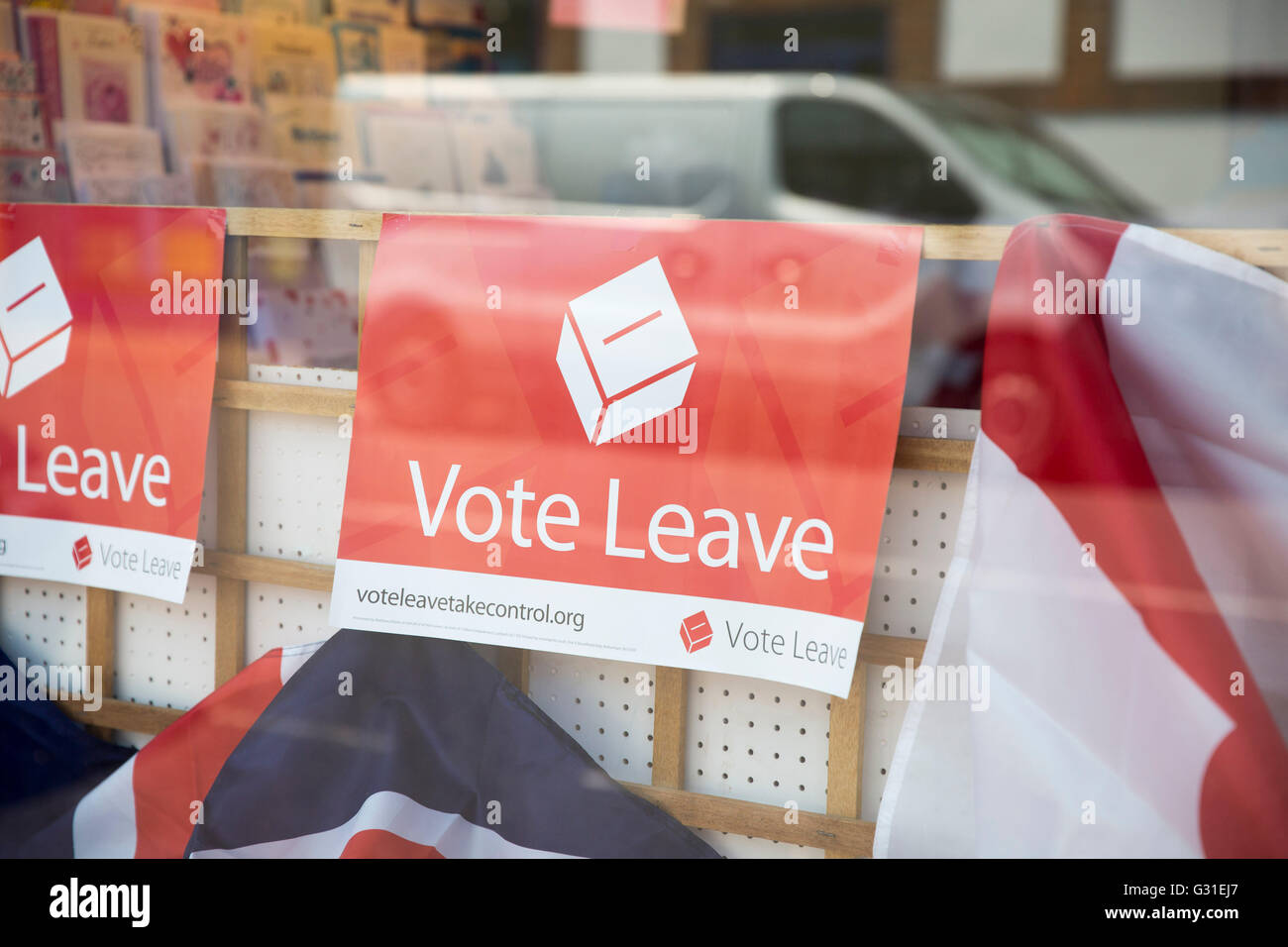 A Vote Leave campaign poster situated inside a shop window in ...