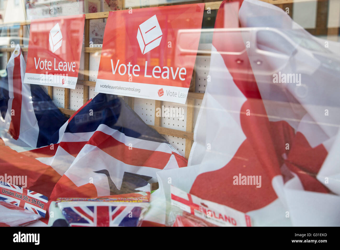 A Vote Leave campaign poster situated inside a shop window in ...