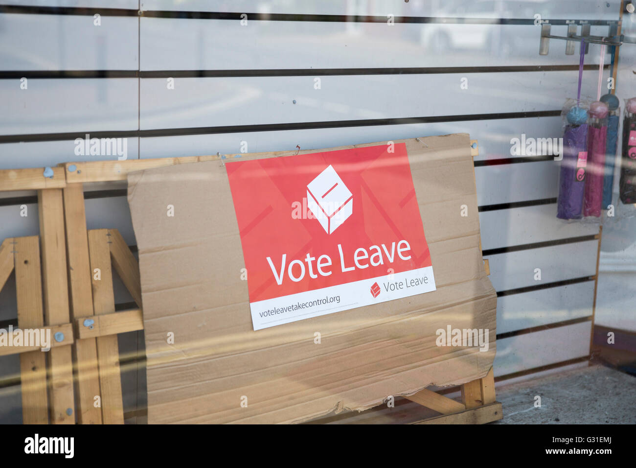 A Vote Leave campaign poster situated inside a shop window in ...