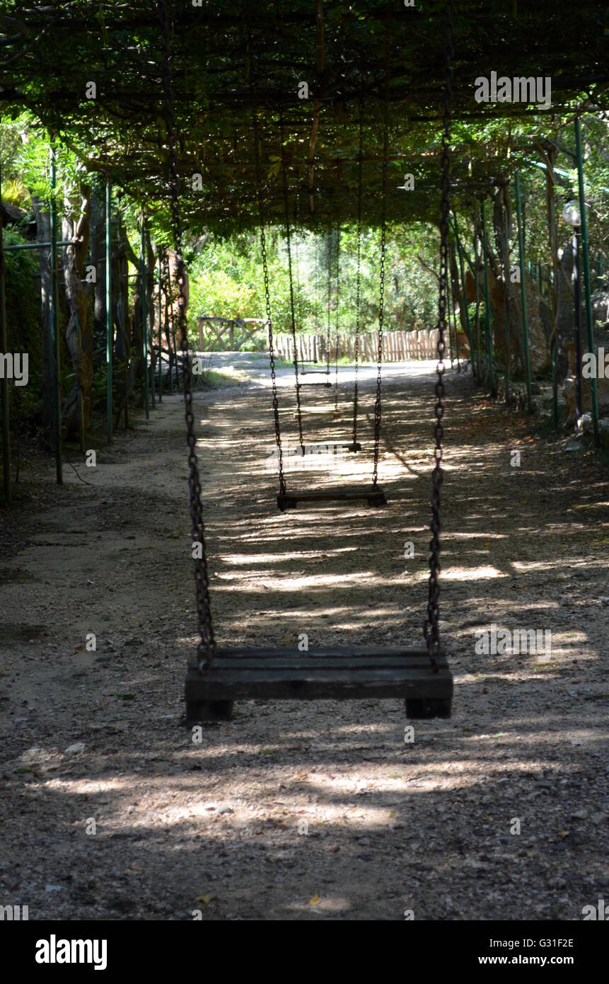 Swinging day park hi-res stock photography and images - Alamy