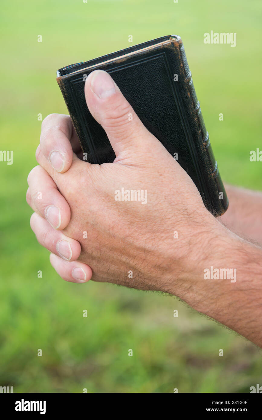 Man praying outside Stock Photo - Alamy