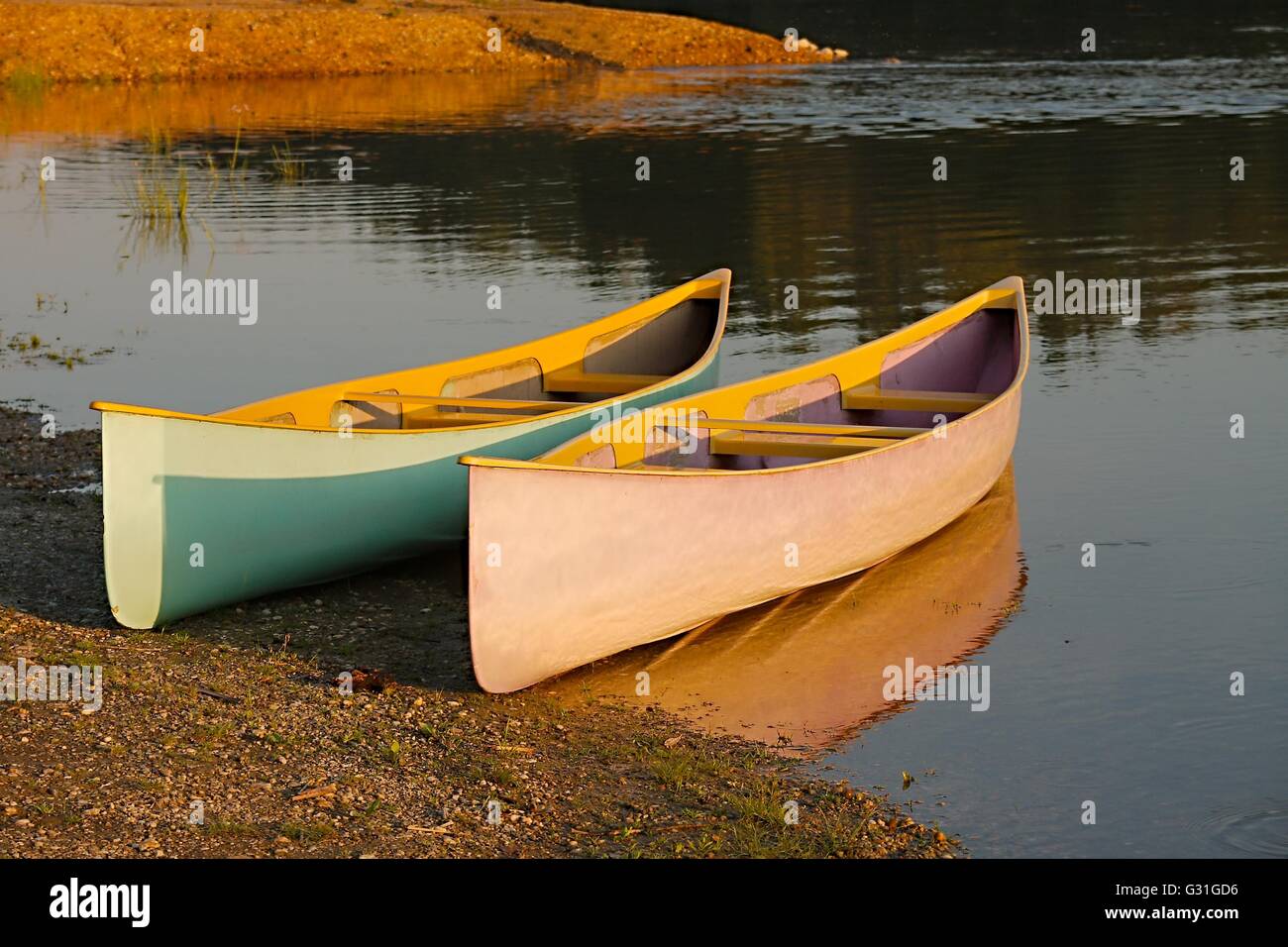 Canoes on the Riverside Stock Photo - Alamy