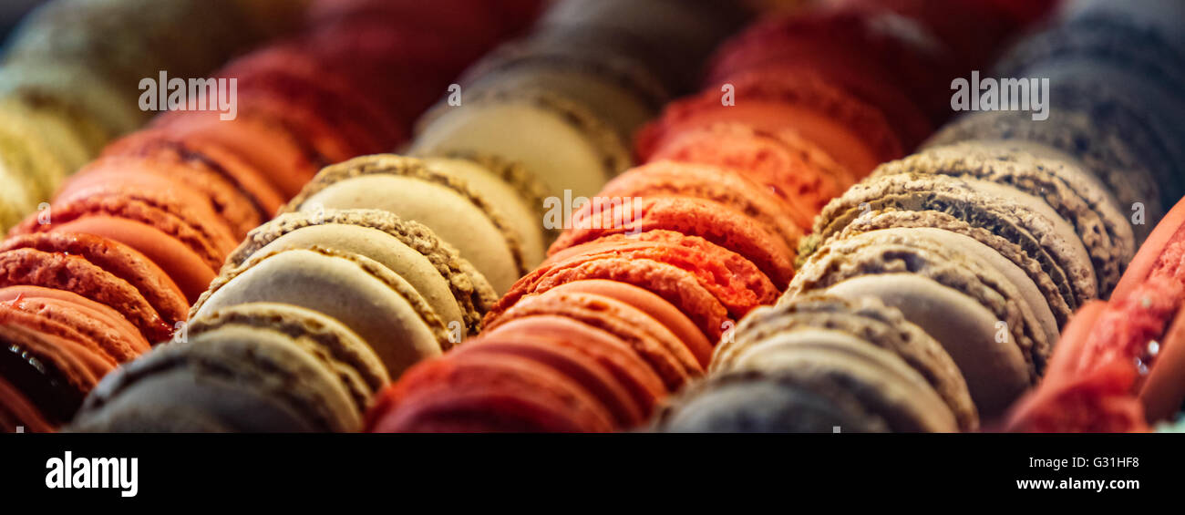 Traditional french colorful macarons in a rows in a box Stock Photo - Alamy