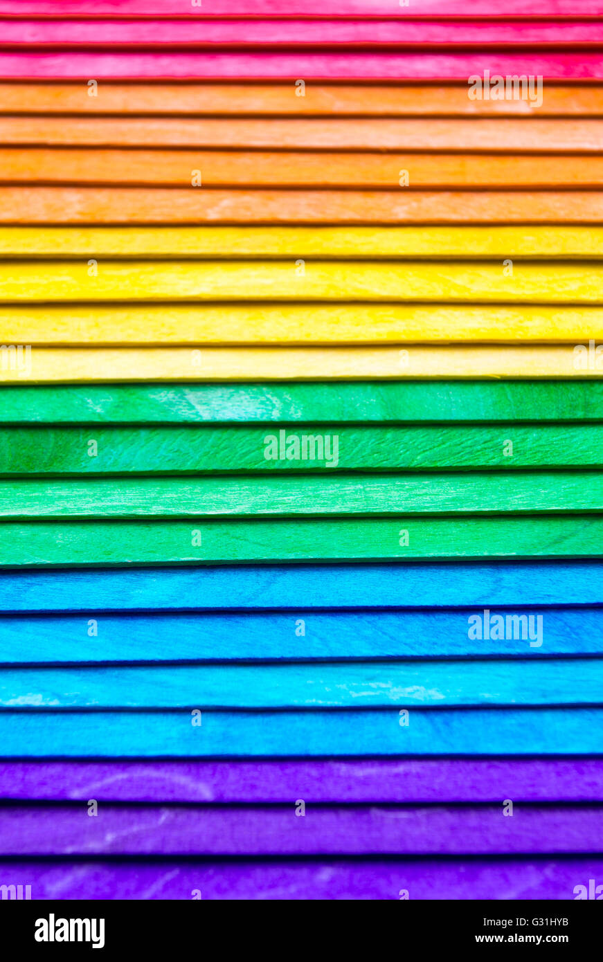 Abstract rainbow spectrum background on textured layered wood Stock ...