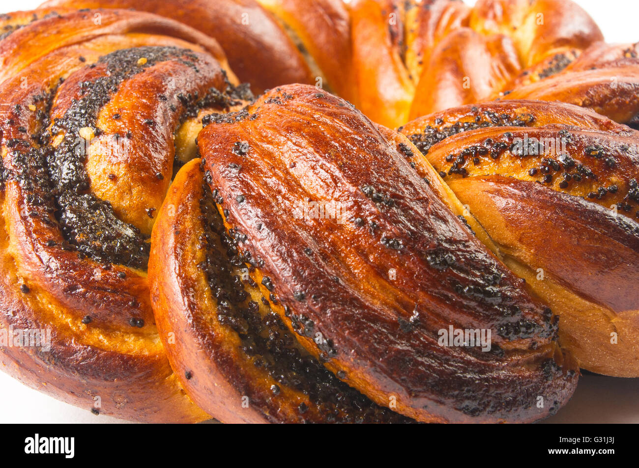 braided poppy seed round loaf on white background Stock Photo - Alamy