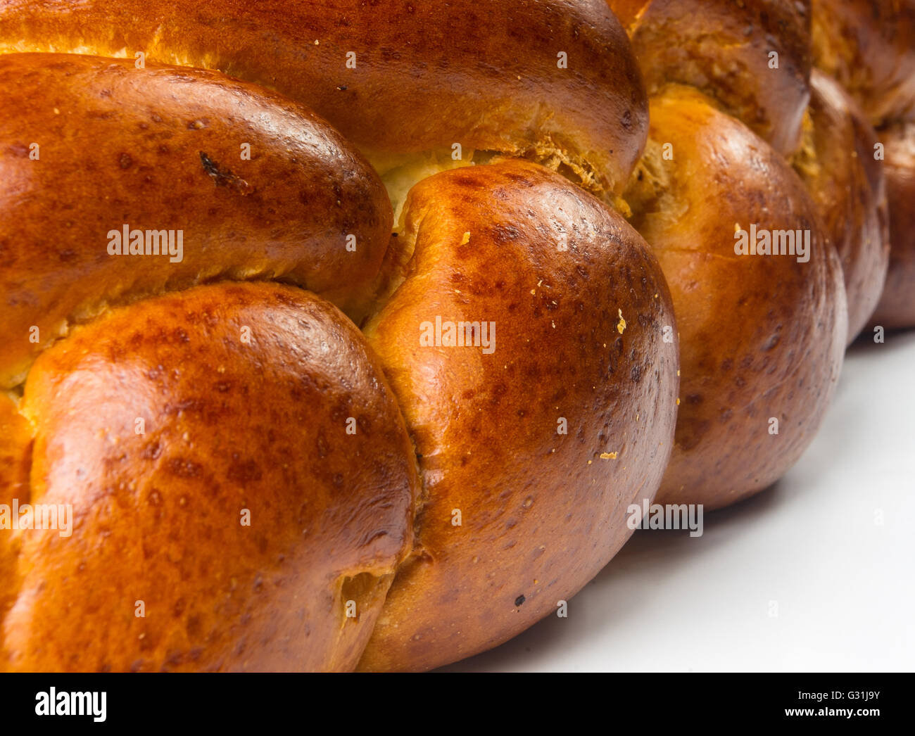 chunks large braided loaf on white background Stock Photo - Alamy
