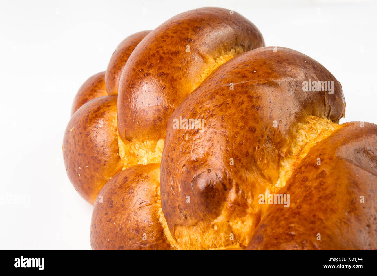 chunks large braided loaf on white background Stock Photo - Alamy