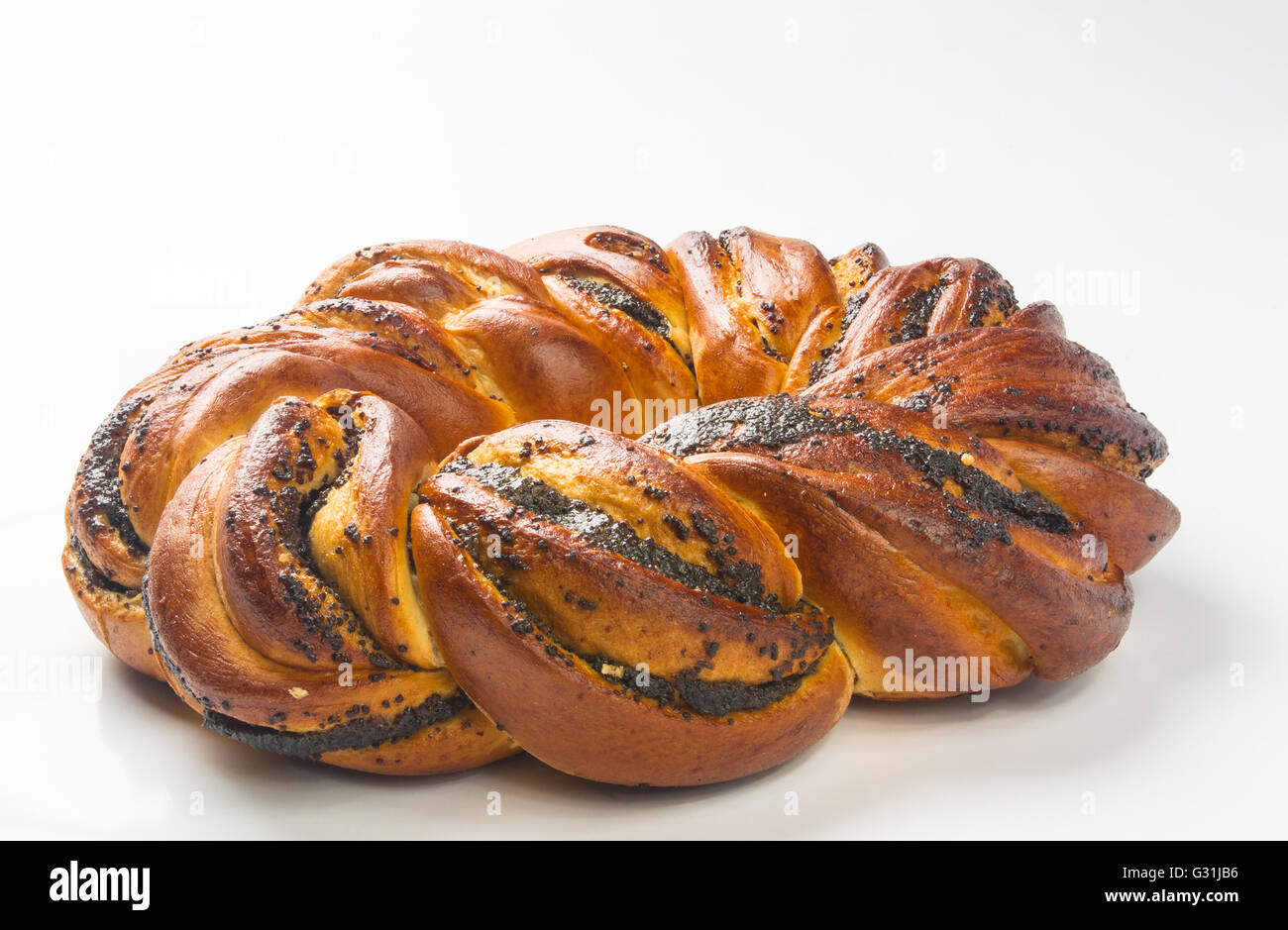 braided poppy seed round loaf on white background Stock Photo - Alamy