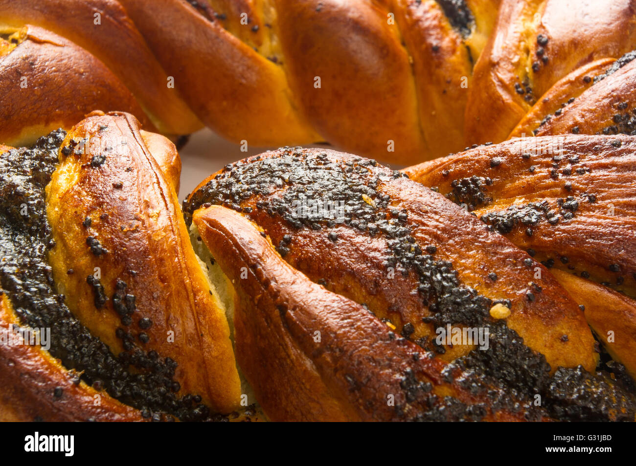 braided poppy seed round loaf on white background Stock Photo - Alamy