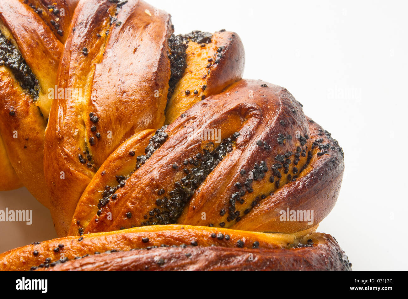 braided poppy seed round loaf on white background Stock Photo - Alamy